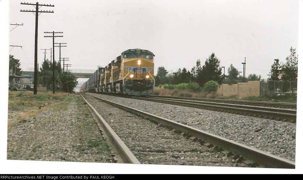 UP 7862 highballs east with three other new C45ACCTE's 7860, 7859, 7858.